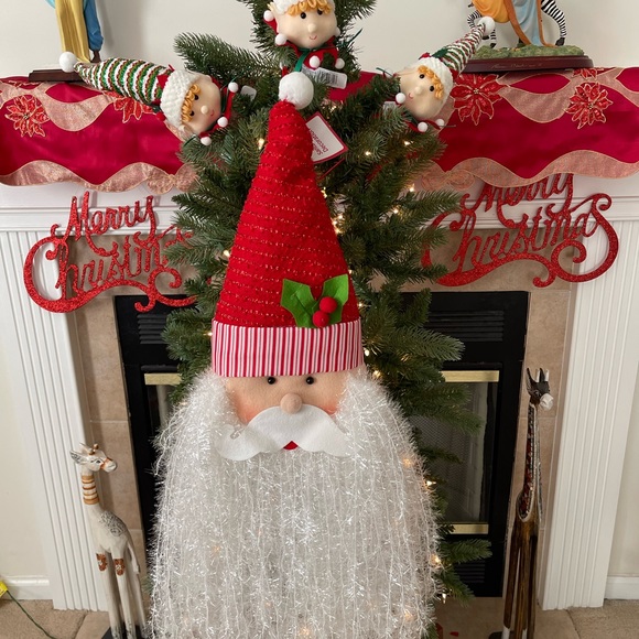 Holiday | Santa Claus Head With A Full Facial Beard And Three Elves ...